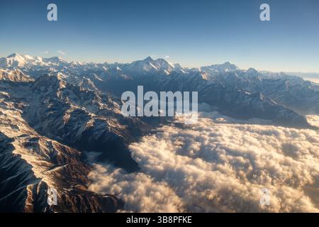 Aerial view of the Himalayas, including Mount Everest, showcasing their ...