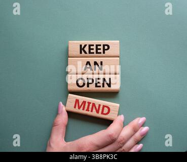 Keep an open mind symbol. Wooden blocks with words Keep an open mind ...