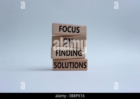Focus on finding solutions symbol. Concept words Focus on finding ...