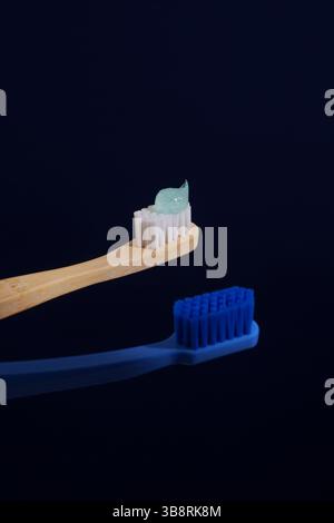 care for the environment - wooden bright toothbrushes on a blue ...