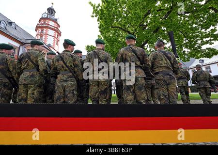 Recruits have lined up for roll call in a barracks in Tokyo. They are ...