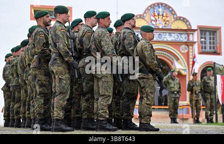 Recruits have lined up for roll call in a barracks in Tokyo. They are ...