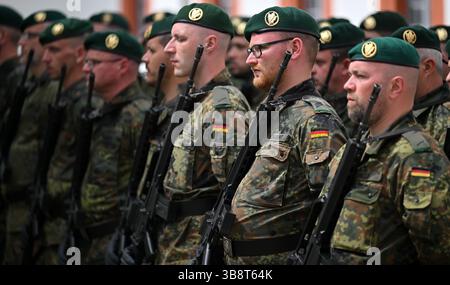 Recruits have lined up for roll call in a barracks in Tokyo. They are ...