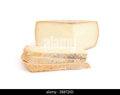 Raclette cheese with Raclette grill. Raclette cheese wheel and slices ...