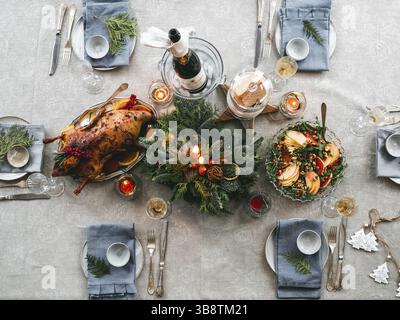 Beautiful table setting with Christmas branches, cookies and dried ...