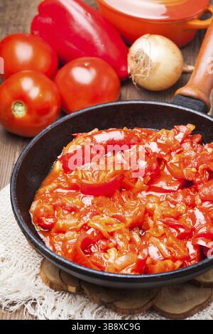 Letcho ingredients and dish in rustic pan Stock Photo - Alamy
