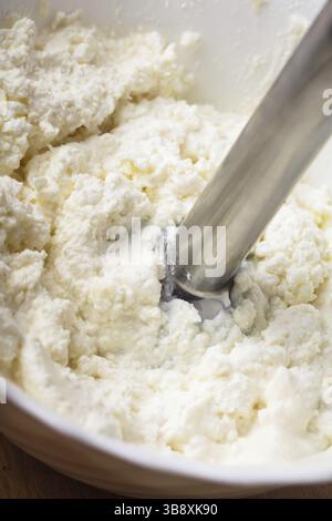 Blender in curd, cooking a dessert, closeup Stock Photo - Alamy
