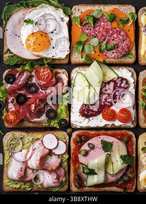 Set of eight different sandwiches with meat in square shape. Top view ...
