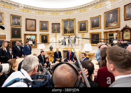 Canada Prime Minister Mark Carney, center, shakes hands with Clerk of ...