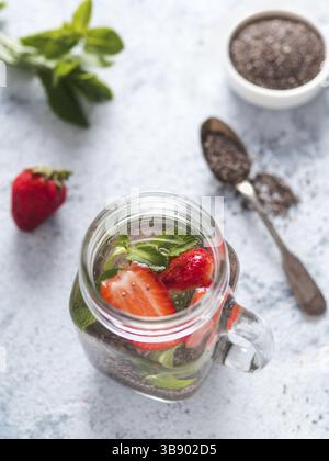 Containers with healthy food on gray background top view Stock Photo ...