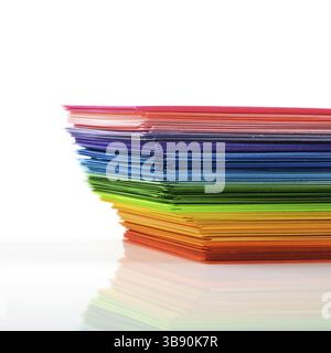 various color paper stacks isolated on white Stock Photo - Alamy