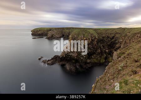 The rugged coast of Bullers of Buchan is located south of Peterhead in ...