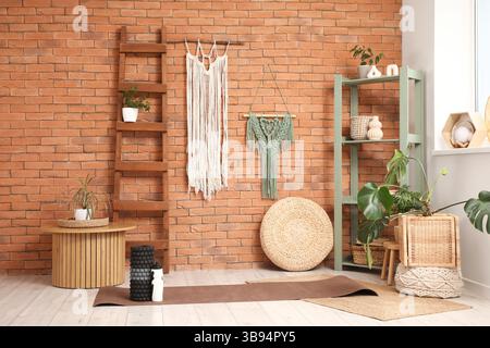 Interior of yoga studio with mat, ladder and shelf unit Stock Photo - Alamy
