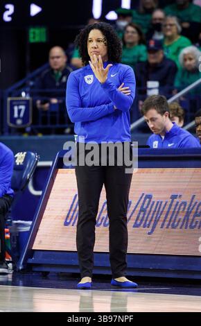 Duke head coach Kara Lawson, center right, reacts during the first half ...
