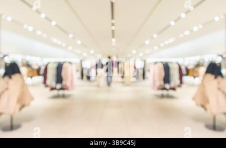 Abstract blur clothing boutique display interior of shopping mall ...