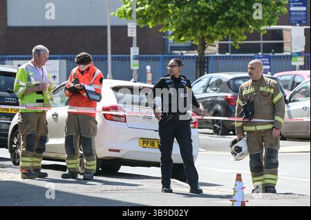Firefighters and police are seen on the scene of a hospital fire in ...