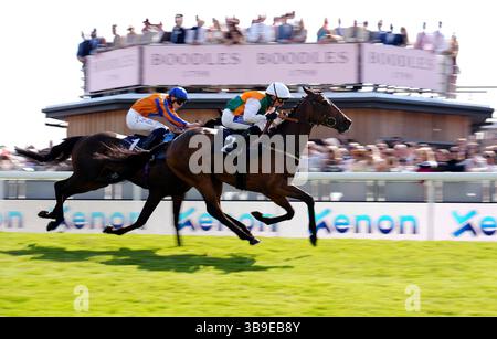 Small Fry ridden by Ashley Lewis (right) on their way to winning the ...