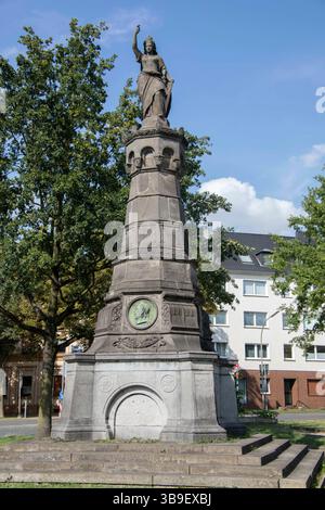 Statue in commemoration of war victims outside disused coal mine now a ...
