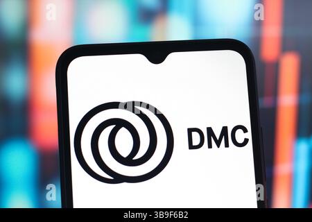 In this photo illustration, the DMC Global logo is seen displayed on a ...