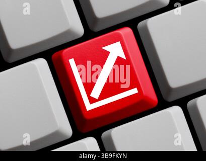 Red computer keyboard and diagram with arrow pointing upwards Stock ...