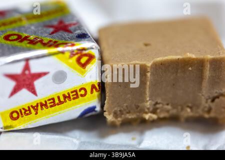 Traditional and original peanut candy known in Brazil as Dadinho. Made ...