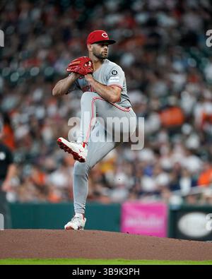 Cincinnati Reds pitcher Nick Martinez walks back to the mound with a ...