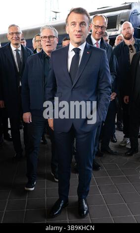 German Chancellor Friedrich Merz, centre, is greeted by Steven ...