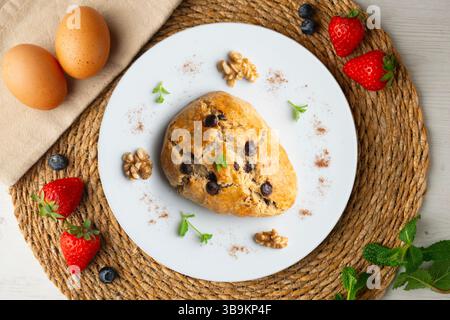 Triangular English scones with dark chocolate chips Stock Photo - Alamy