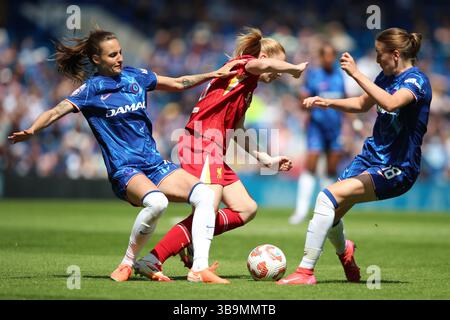 Liverpool's Ceri Holland (left) and Chelsea's Aggie Beever-Jones battle ...
