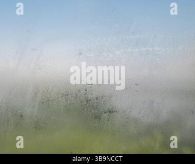 Condensation on the clear glass window. Water drops. Rain. Abstract ...