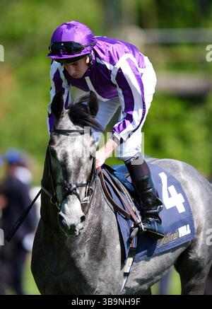 Puppet Master ridden by Ryan Moore (right) on their way to winning the ...