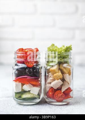 Containers with healthy food on gray background top view Stock Photo ...