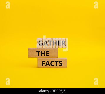 Gather the facts symbol. Wooden blocks with words Gather the facts ...