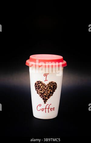 Coffee in a black mug neat coffee beans shape cookies Stock Photo - Alamy