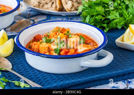 Fish stew made of cod, salmon, smoked haddock and prawns Stock Photo ...