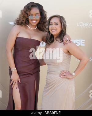 (L-R) H.E.R. and Mom Agnes Wilson at the Gold House 4th Annual GOLD ...