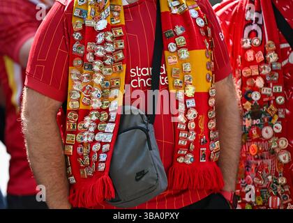 Liverpool pin badges ahead of the Premier League match at Anfield ...
