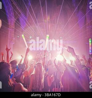 Silent Disco inside Manchester Cathedral with neon lights and dancing ...