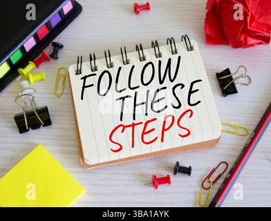 Follow these steps symbol. Concept words Follow these steps on white ...