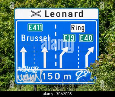 Blue Belgian road signs at the Leonard junction in Auderghem, Brussels ...