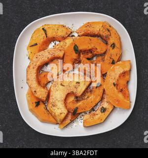 Perspective view of empty square plate on wooden background. Empty ...