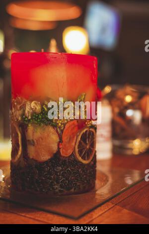 Red candle in glass stand. Isolated on white background Stock Photo - Alamy