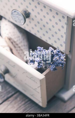 Bunch of dry lavender in decorative little shabby chic chest of drawers ...