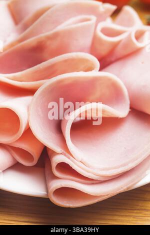 Buffet. Slices of ham and pork sausage. France Stock Photo - Alamy