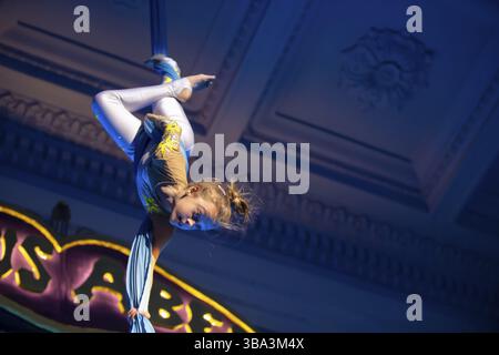 girl performs in air acrobatic elements Stock Photo - Alamy