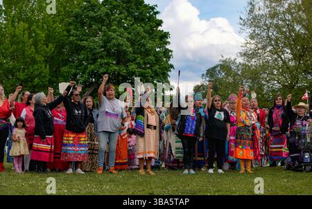People sing during a gathering at May 13 Square in Antananarivo ...