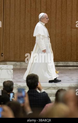 Pope Leo XIV arrives for an audience with volunteers and workers of the ...