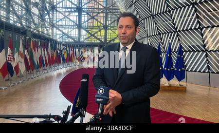 German Finance Minister Lars Klingbeil, right, and his counterpart from ...
