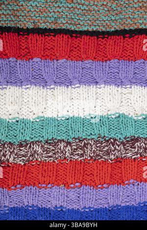 different colored stripes on the knitted fabric surface. textiles retro ...