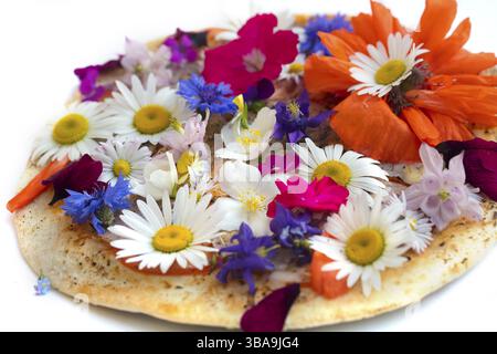 Creative pizza topped with colourful flowers Stock Photo - Alamy